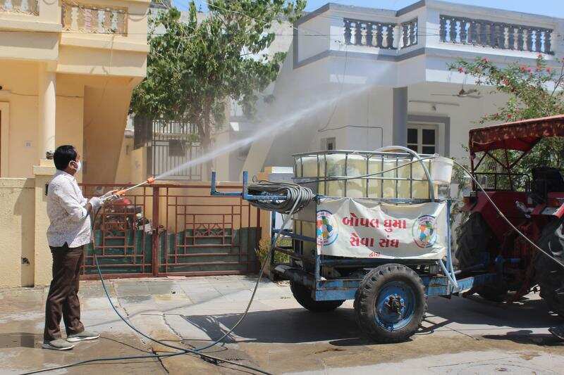 NGO sanitizes Bopal, Ghuma societies, houses | Ahmedabad News - Times ...