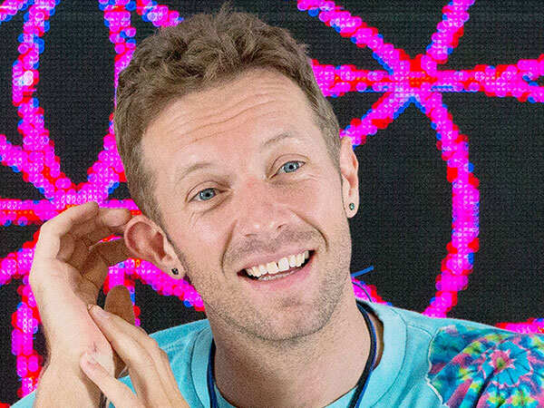 Coldplay's 'Up and Up' shows singer Chris Martin in an upside-down ...