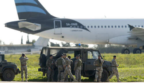 Libyan plane hijacked, lands in Malta: What we know so far : The ...
