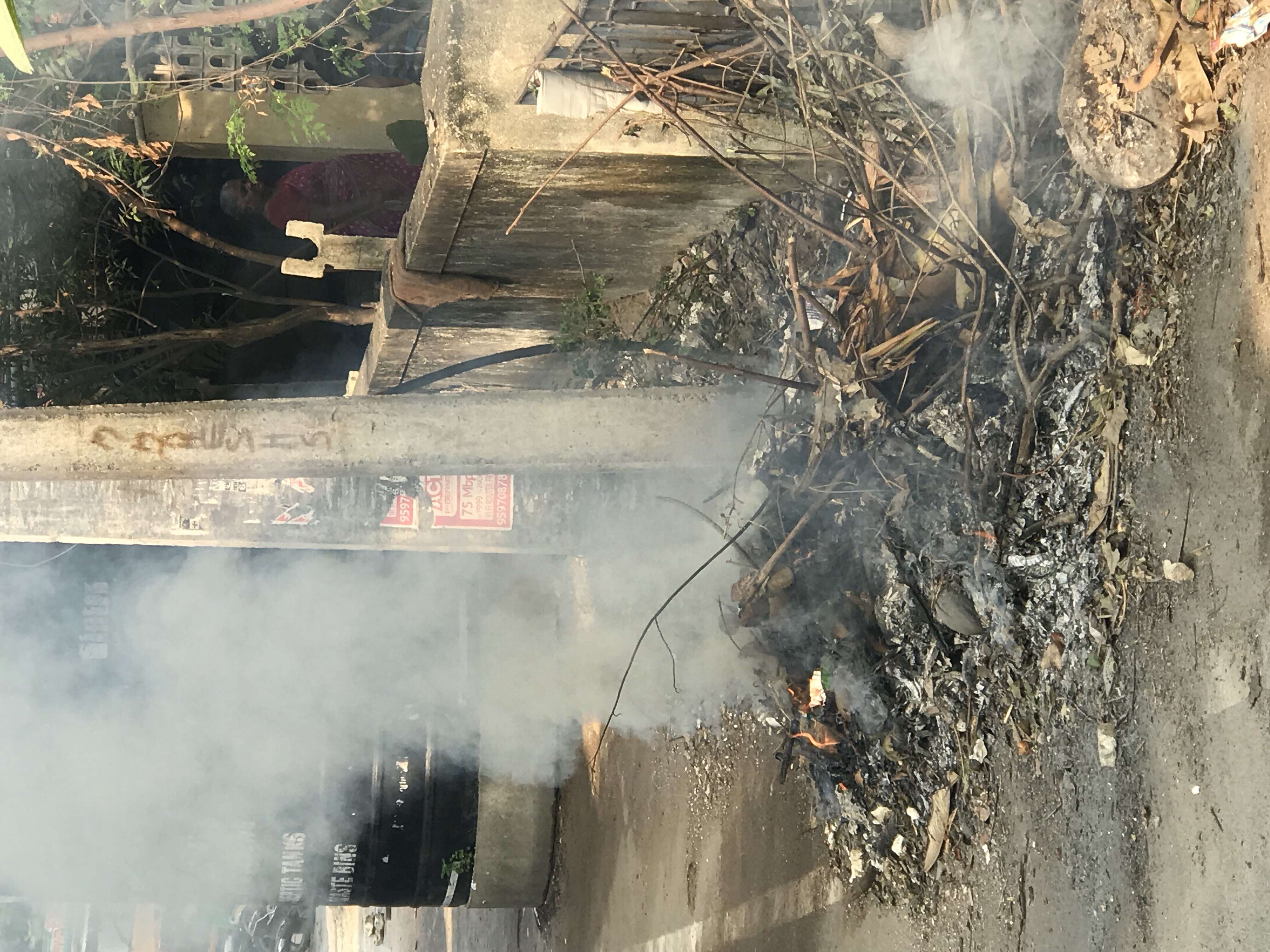 Open burning under electricity wires causes worry - Times of India