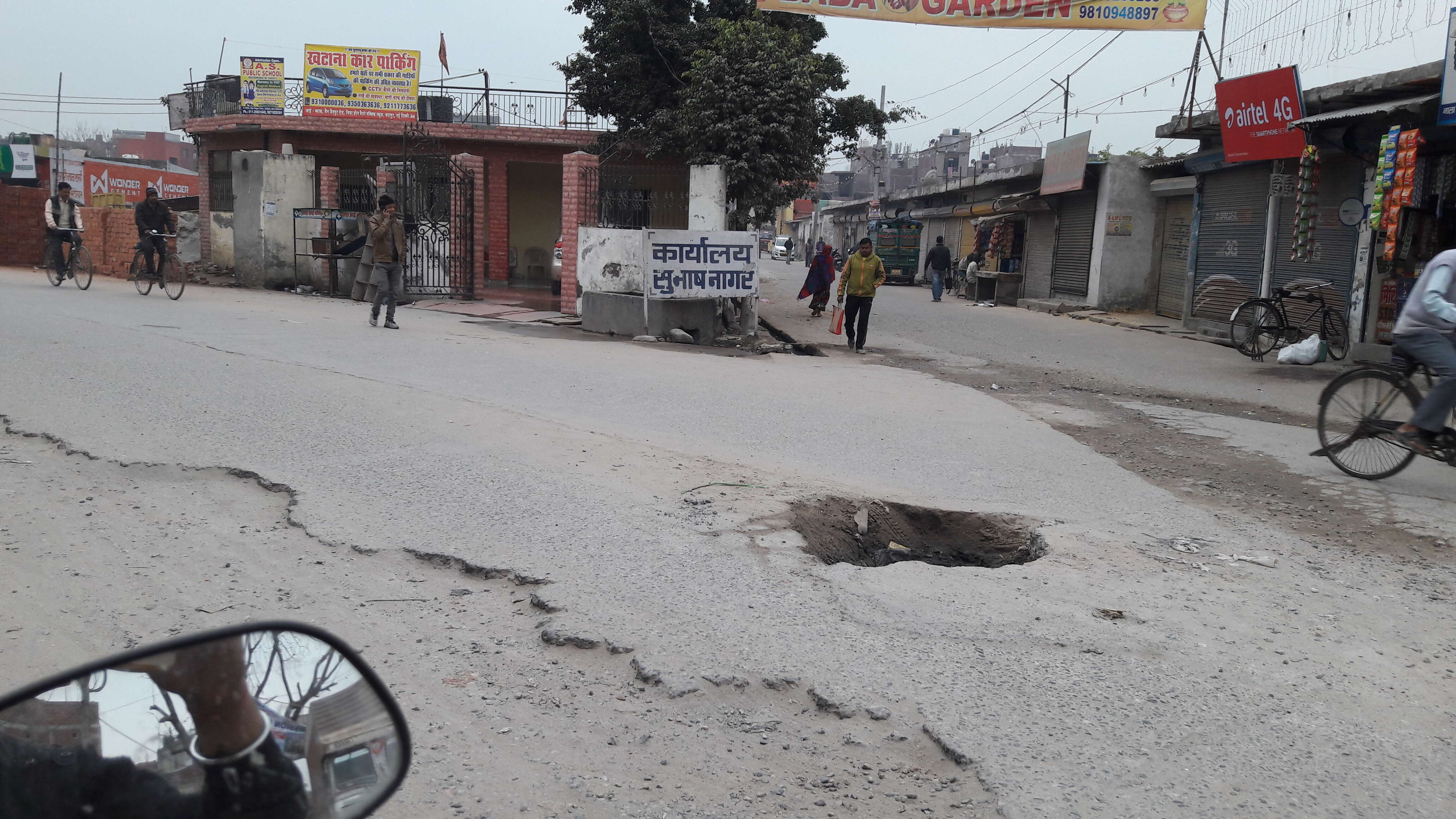 Open manhole in the middle of the road - Times of India