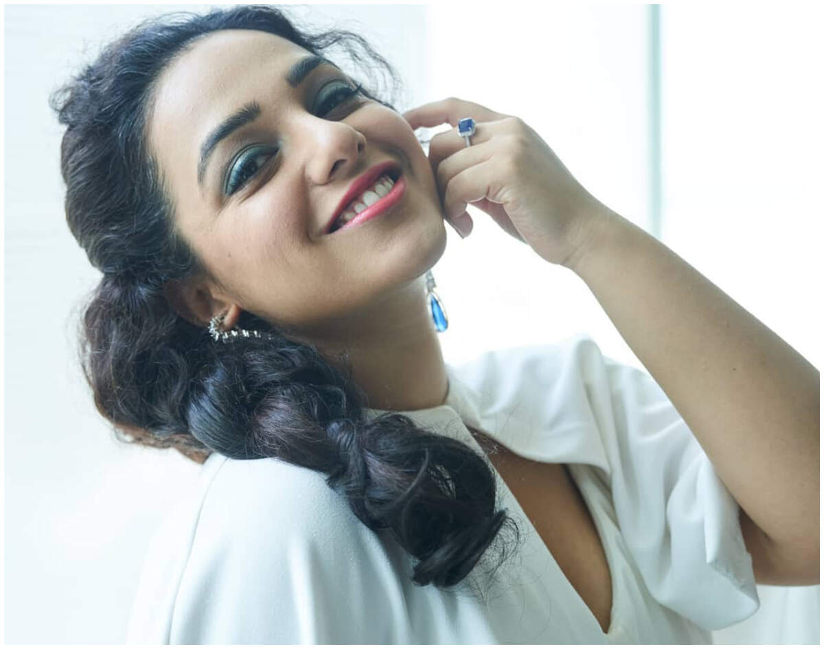 Nithya Menon Parents