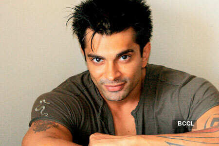 Karan's waiting for the right girl - Times of India
