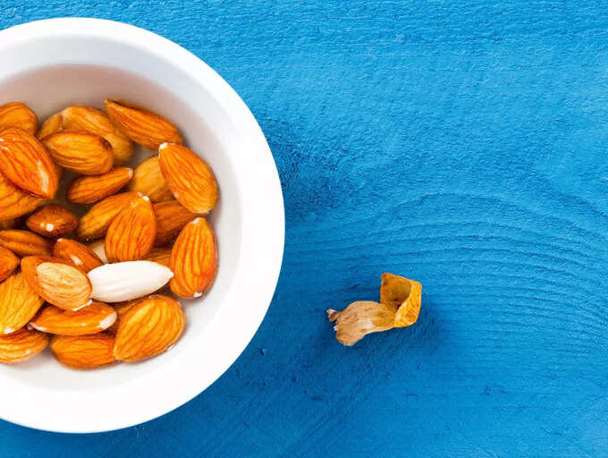 Simple ways to remove almond peel instantly | The Times of India