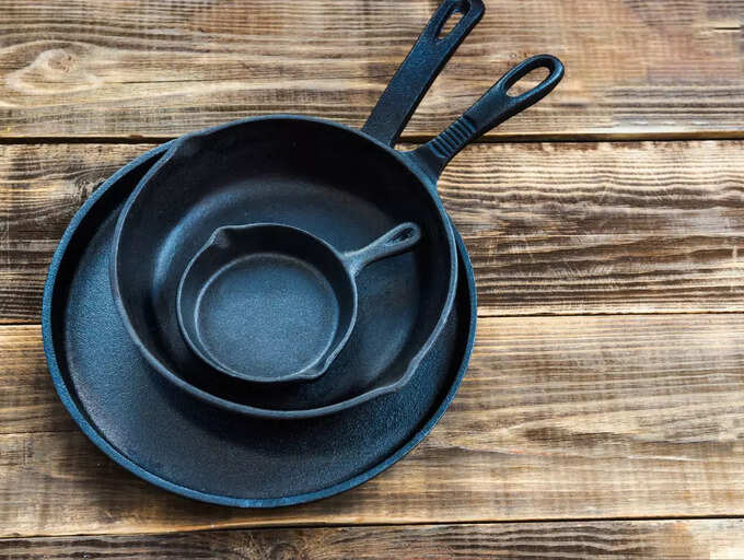 Simple tricks to clean cast iron pans and pots at home | The Times of India
