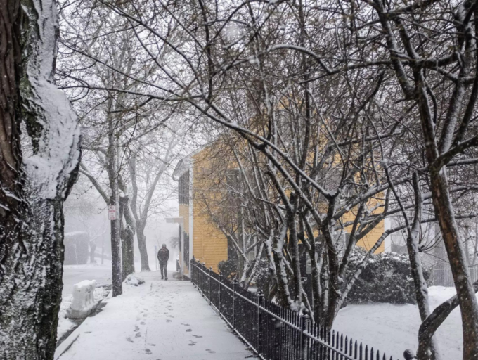 Heavy snowfall, freezing rain, icy roads: Striking photos of snow ...