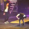 Video from the concert shows the teen singer turning his back toward ...