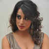 Mahie Gill strikes a sexy pose during a photoshoot.