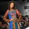 Laxmi Rana presents a creation by designers Ashima and Leena during Day ...