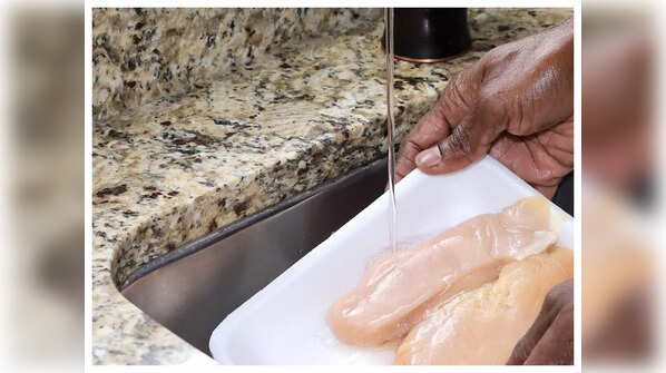 Why you shouldn't wash raw chicken before cooking