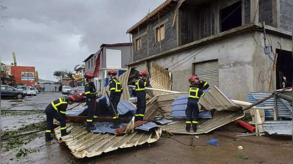 In pics: Cyclone Chido leaves a trail of destruction in France's ...