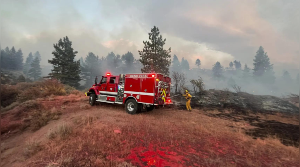 Hundreds evacuated as firefighters battle to contain wildfires across ...