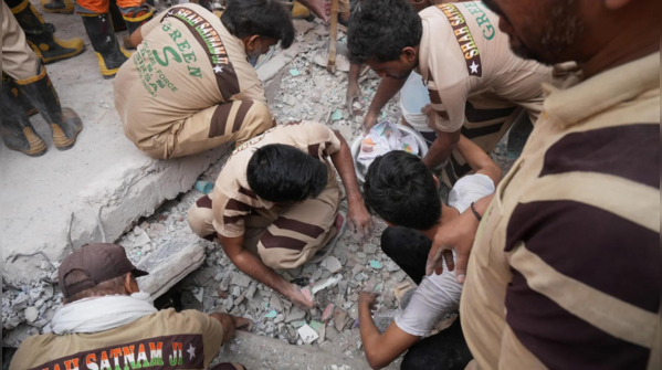 'Pancake' collapse of Delhi building in Mustafabad tests rescuers