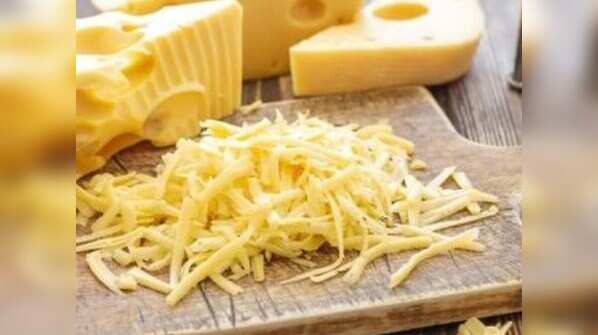 Never use pre-shredded cheese!
