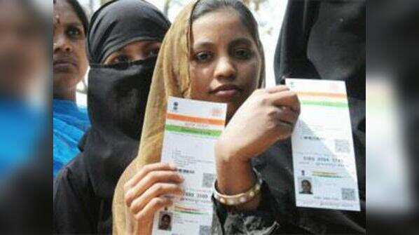 Bid to make Aadhaar card must for government benefits