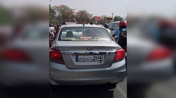 CM Yogi, PM Modi on vehicle number plates in UP