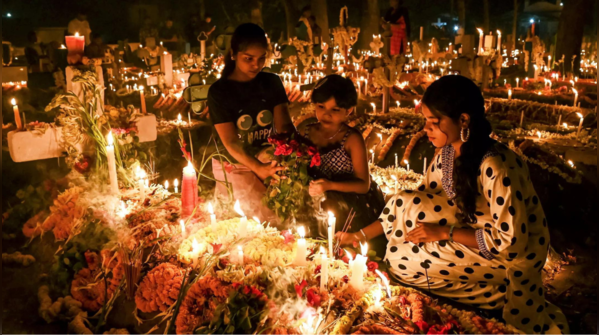 All Souls' Day celebrations across India: People light candles, lay ...