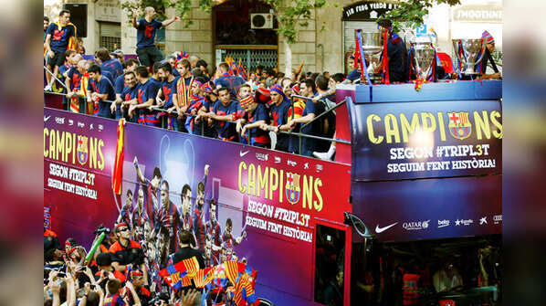 Barcelona celebrate treble in style