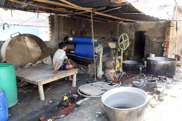 A river turns red: Pollution bleeds Hindon | Noida News - The Times of India