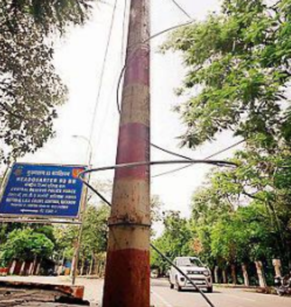 Dangling danger: Live wires hang loose, but admin finds it a tall order ...