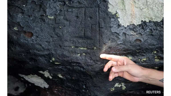 Human faces discovered on rocks found in the Amazon river - Times of India