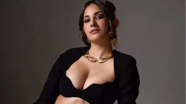 'Sunflower Vibes': Amyra Dastur stuns fans in jaw-dropping yellow thigh-high slit gown