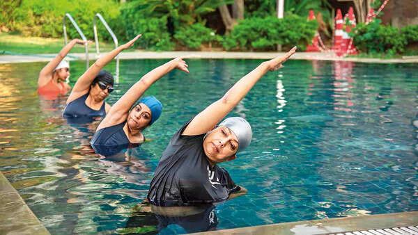 Take a plunge: Try aqua yoga this summer - Times of India