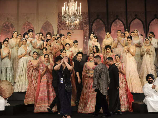 Swimsuit model Mara Martin breastfeeds her baby on runway