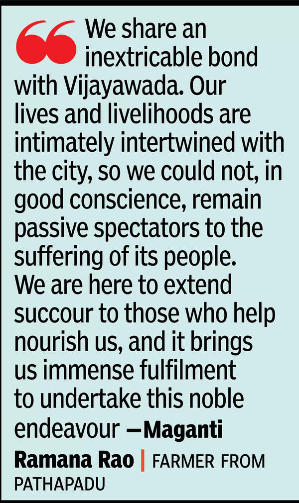 Vijayawada: Farmers rescue stranded Vijayawada residents in Budameru ...