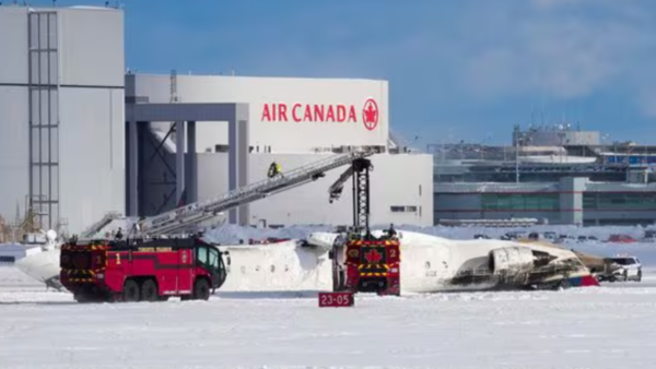 Delta flight’s terrifying flip at Toronto airport leaves passengers in ...