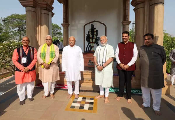 PM Narendra Modi praises RSS for its role in nation-building with Sangh chief Mohan Bhagwat by ...