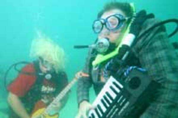 An underwater degree ceremony | undefined News - Times of India