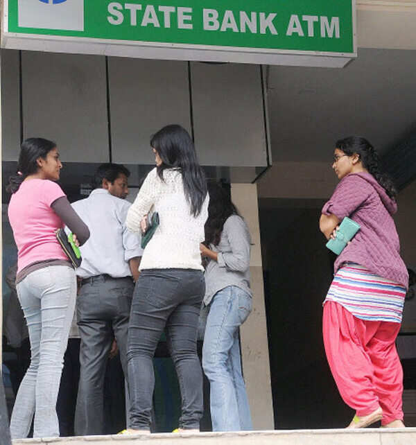 Only 2 free third-party ATM withdrawals/month - Times of India