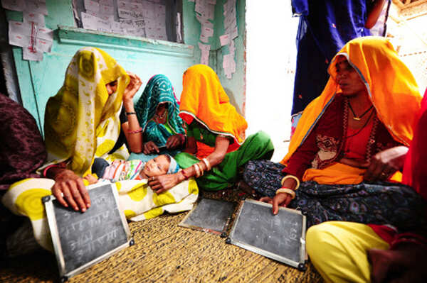 Literacy rate jumps 10% in a decade in India | India News - Times of India