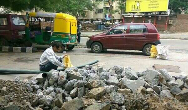 Pothole Menace: This scientist has been repairing potholes and ...