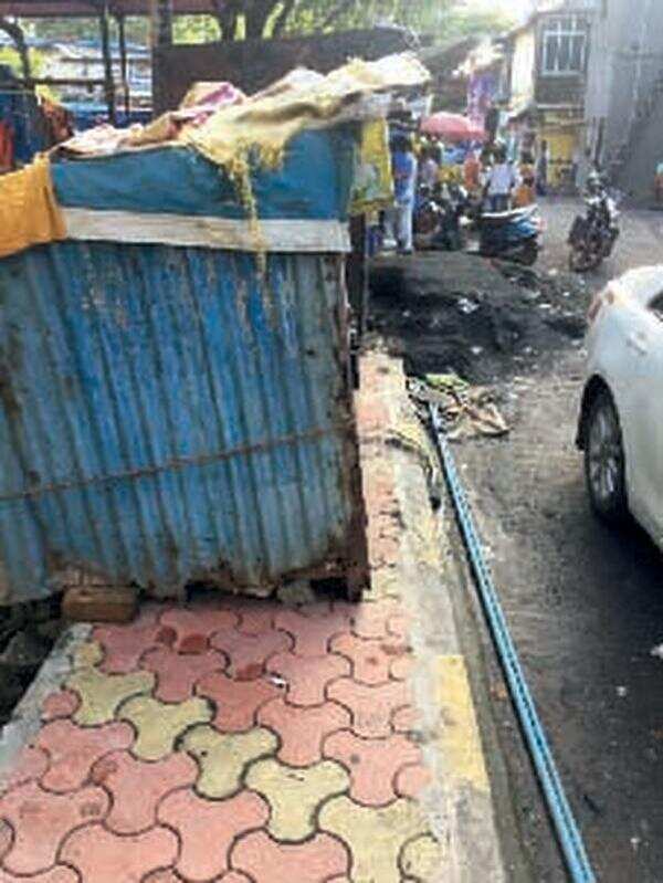 Annexing a footpath - Times of India