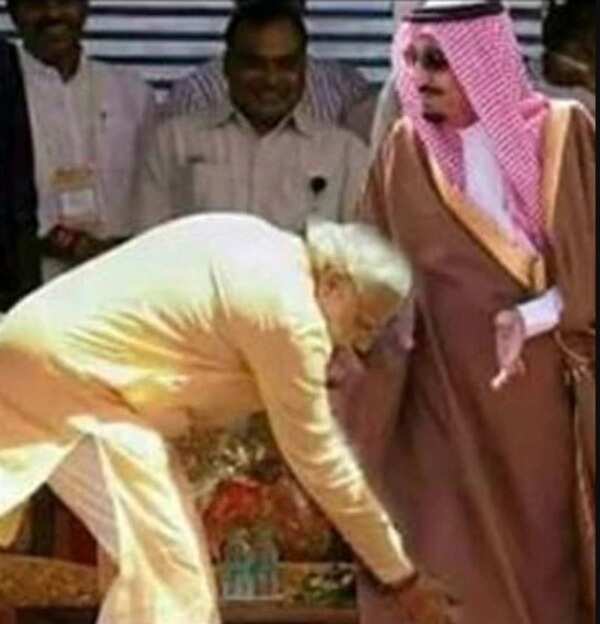 FAKE: Viral photo of PM Modi touching Sonia Gandhi’s feet - Times of India