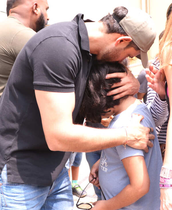 Photos: Hrithik Roshan consoles a young fan as she cries after seeing ...