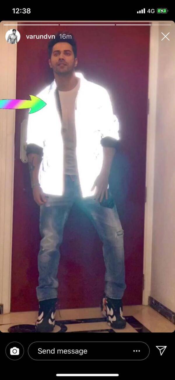 Varun Dhawan poses for a photo in his glowing jacket! | Hindi Movie ...