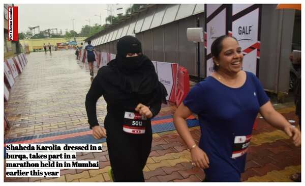 Women runners go an 'extra mile' in their traditional attire - Times of ...