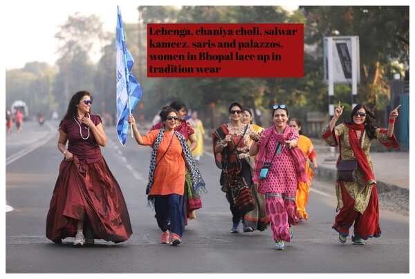 Women runners go an 'extra mile' in their traditional attire - Times of ...