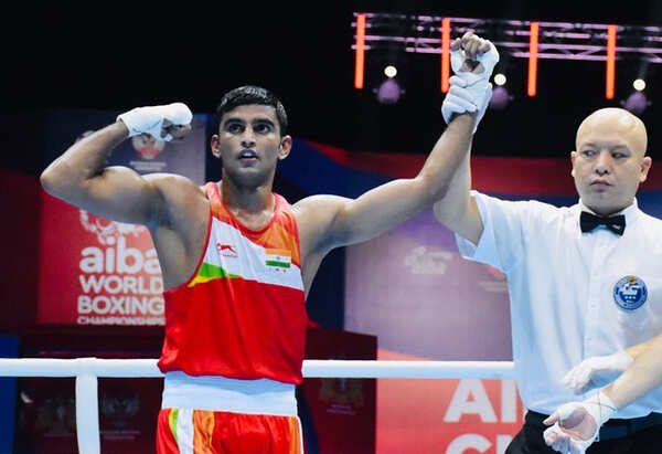Olympic-bound boxer Manish Kaushik sparring at home with his brother ...