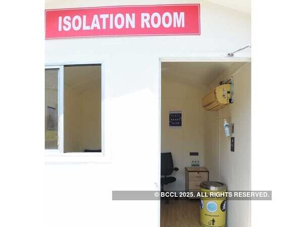 With isolation rooms, partition sheets and social distancing markers ...