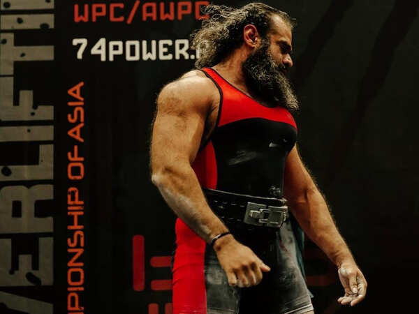 Bengaluru: Powerlifting champ shoulders burden of last rites of Covid ...