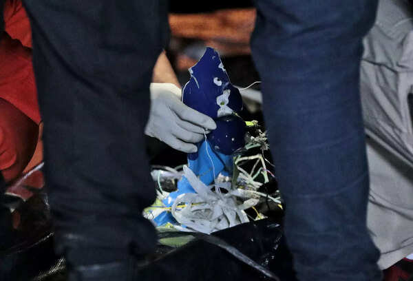 Indonesia plane crash: Body parts, debris found from Java Sea - Times ...
