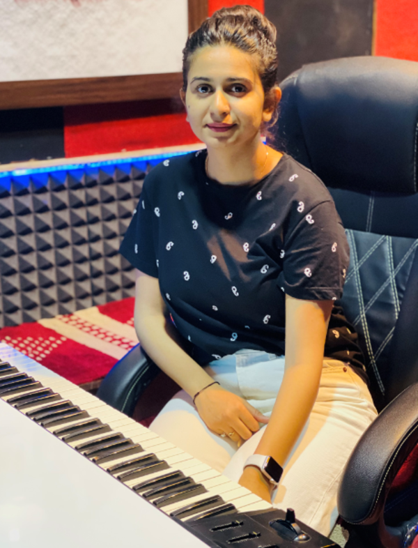 Kinjal Dave hints a new song as she poses in a recording studio ...