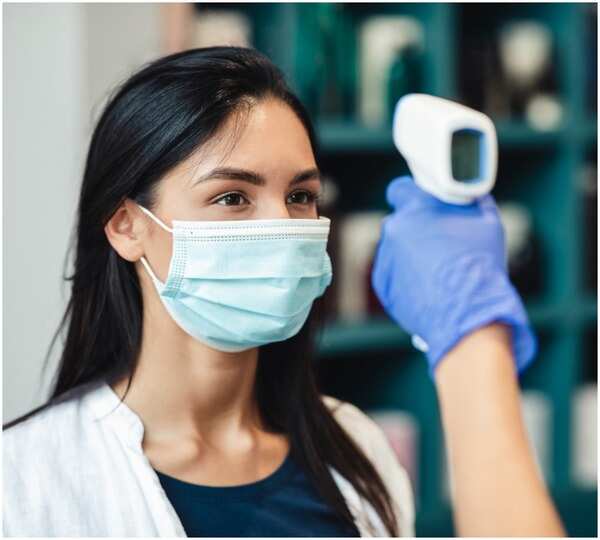 Temperature checks are mandatory before entering a salon (iStock)