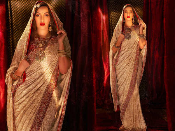 Nora Fatehi flaunts her hourglass figure in a body-hugging golden dress ...