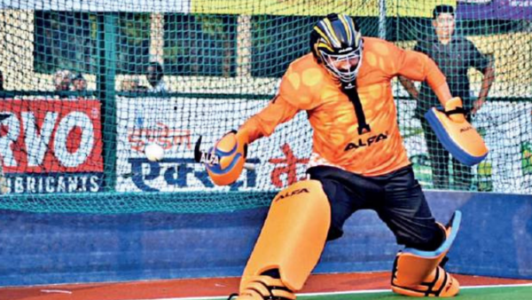 Punjab CM Charanjit Singh Channi dons goalie’s gear, defends hits from ...