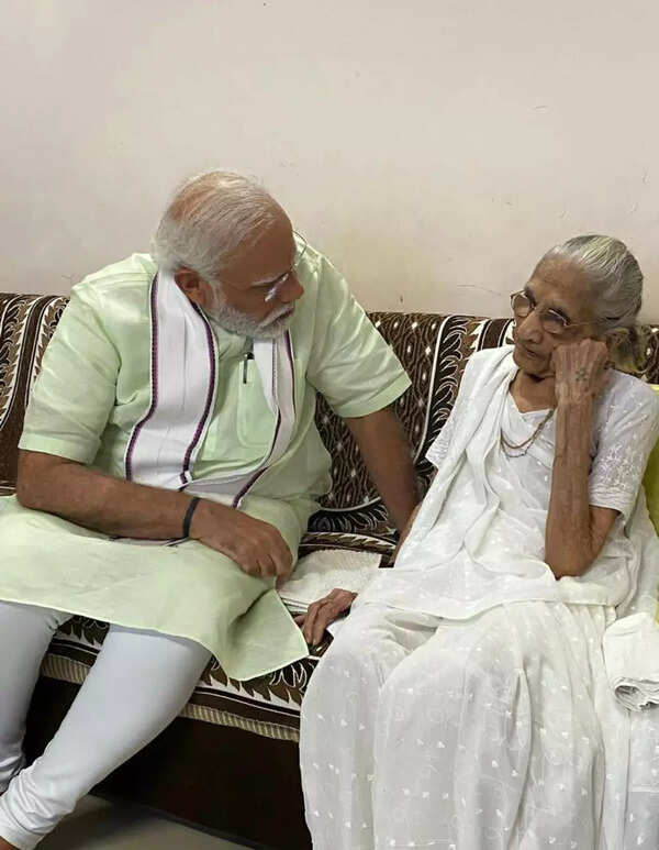 PM Modi meets his mother Heeraben at her Gandhinagar residence in ...